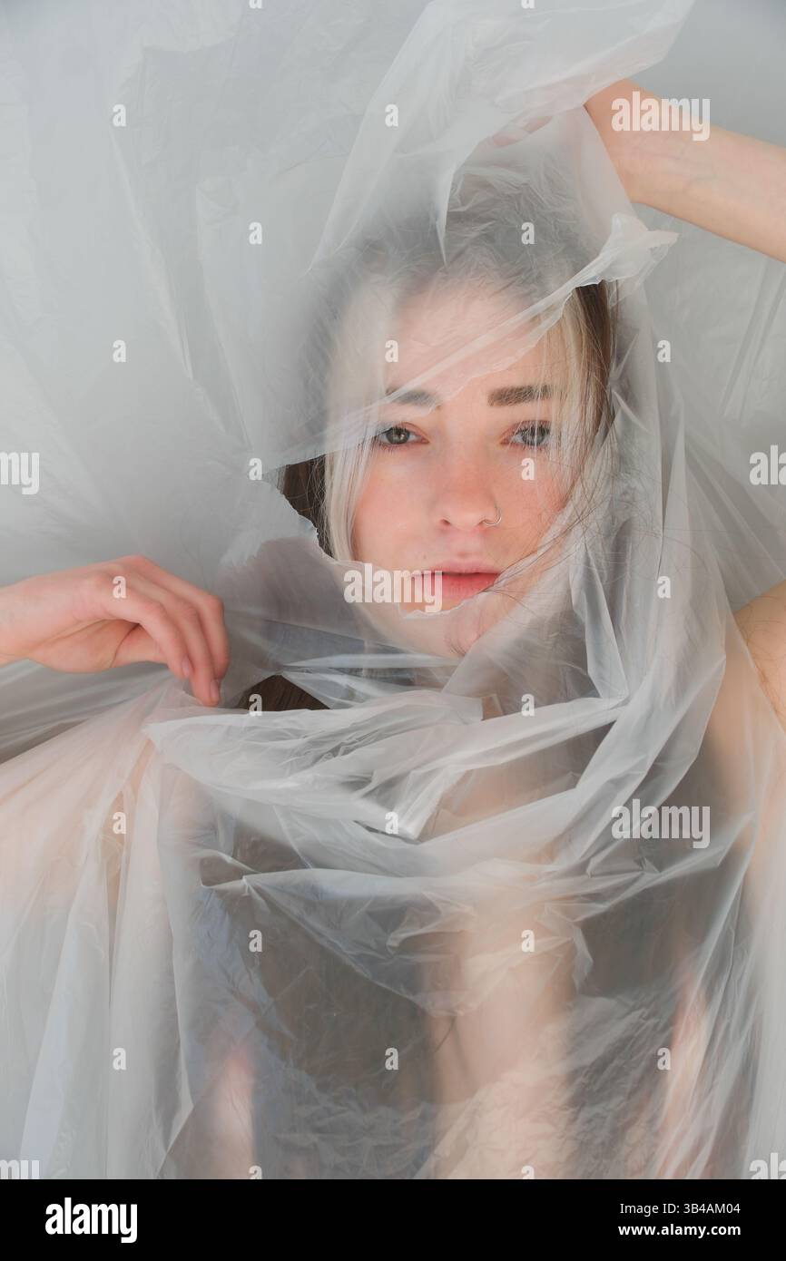 Wrapped in sheet hi-res stock photography and images - Alamy