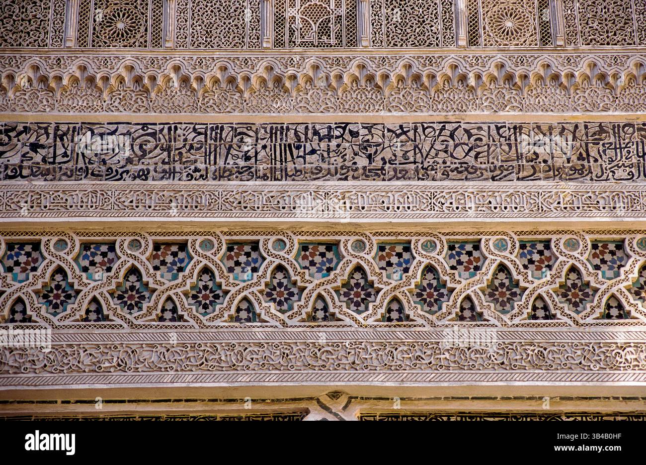 Sculpted stucco combined with Koranic Arabic calligraphy and ...