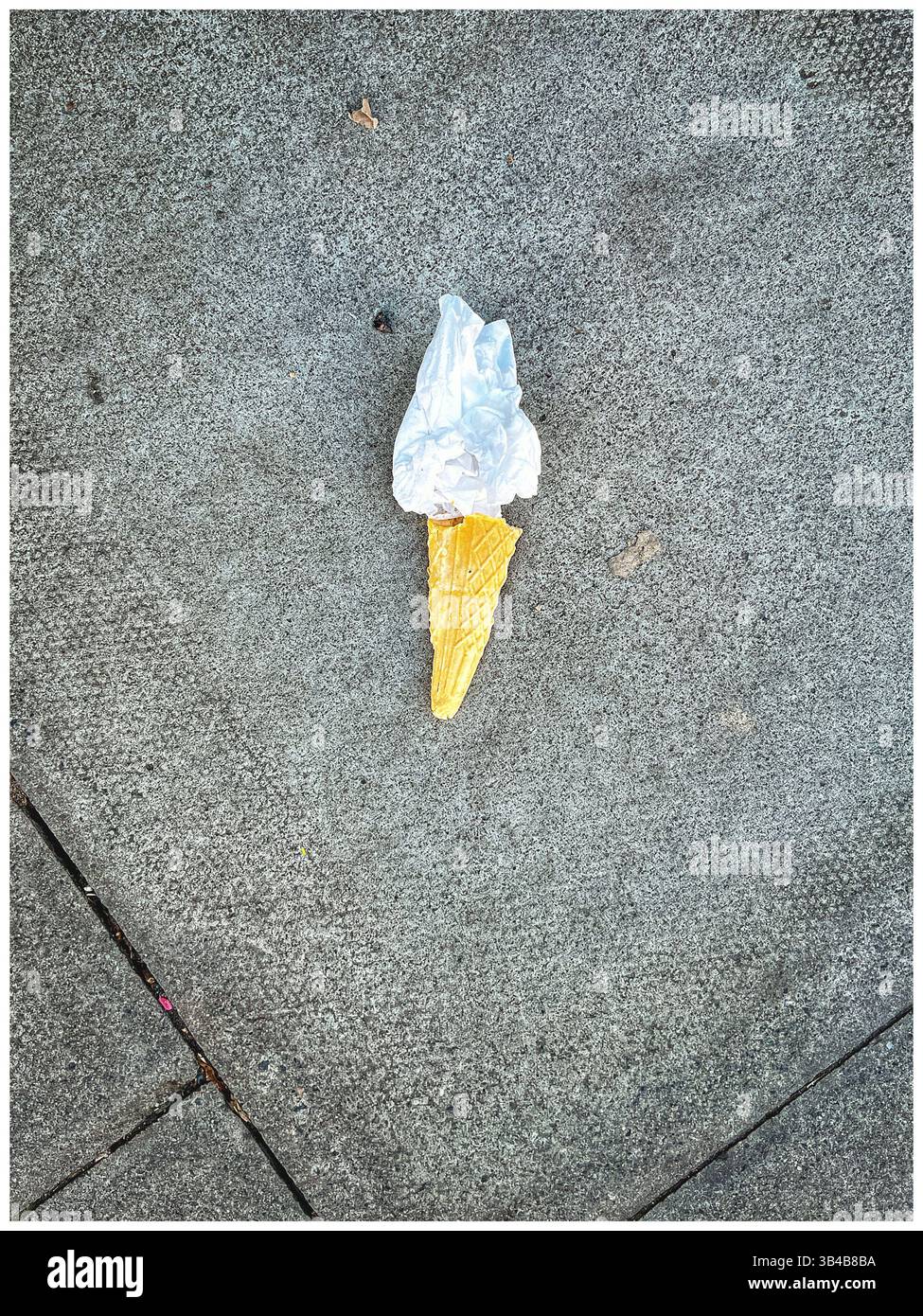 Tissue that looks like ice cream and and a squashed wafer cone on the ...