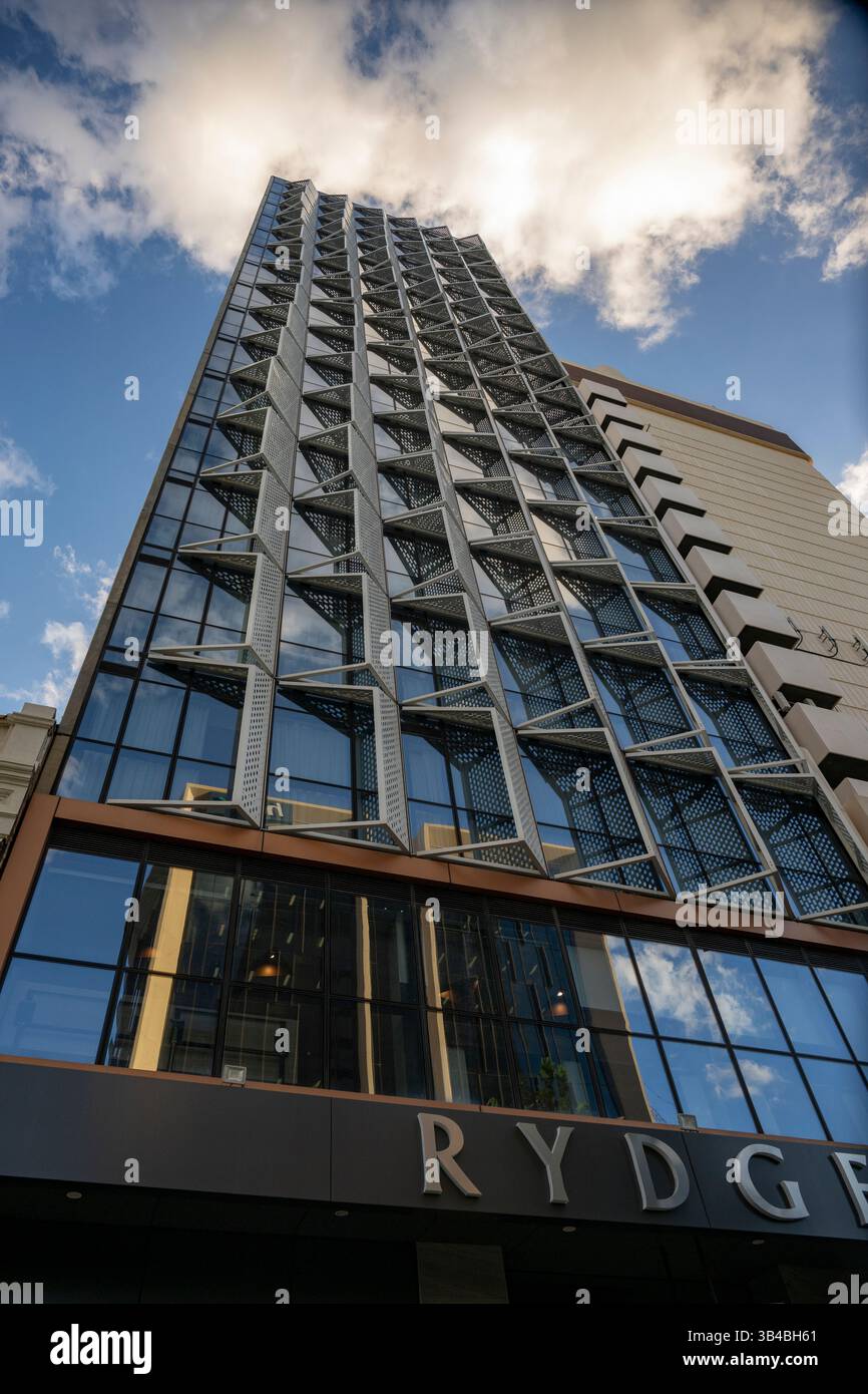Upward view of the exterior façade of a high rise building in Fremantle ...