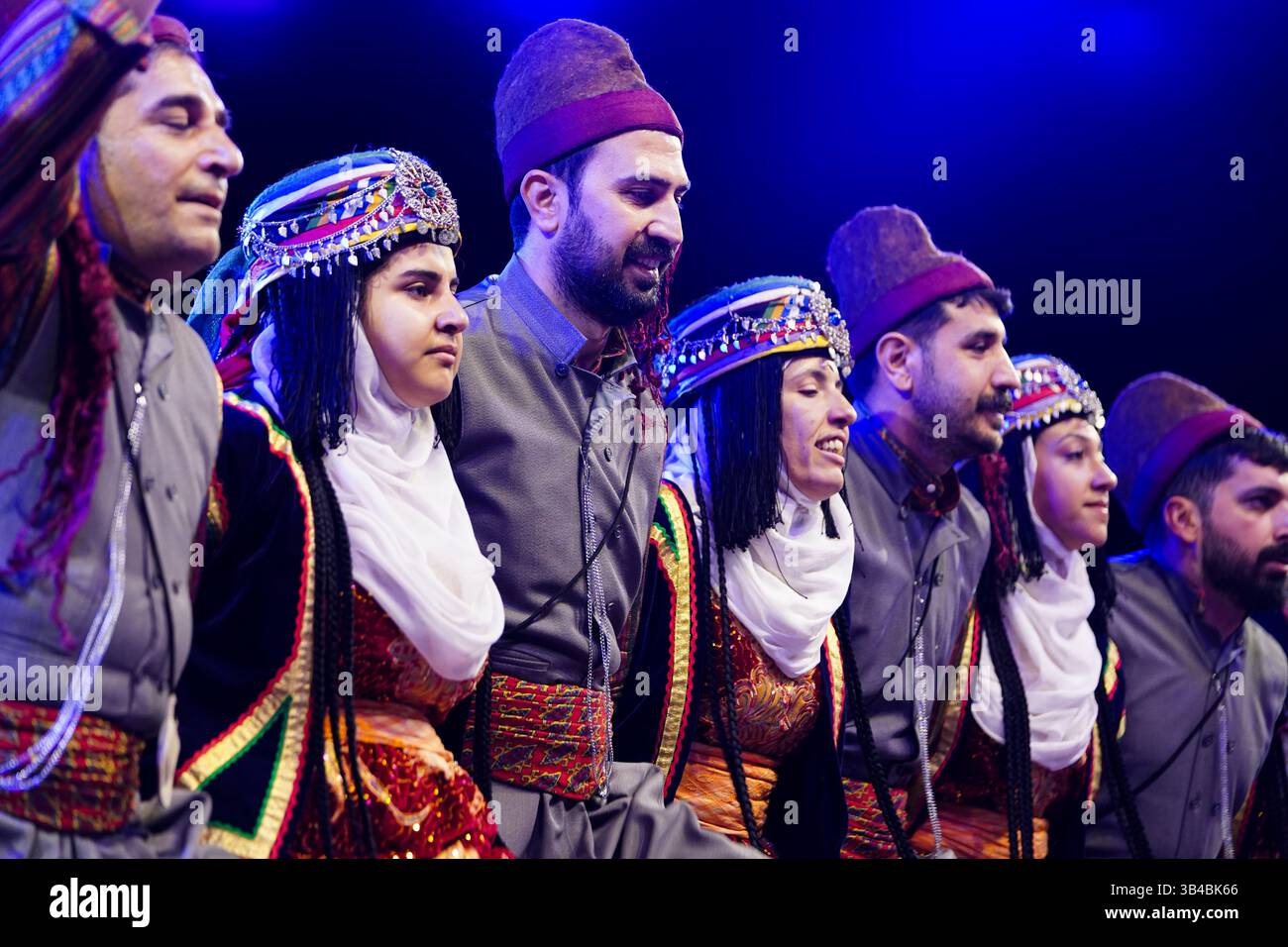 Zakho, Iraq. 29th Apr, 2025. Members of the Turkish Kurdish group dance on stage in traditional ...