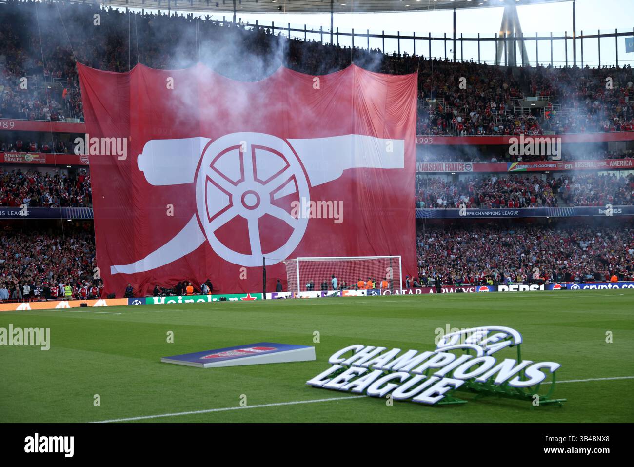 A tifo of the Arsenal cannon at the Arsenal v Paris Saint-Germain UEFA ...