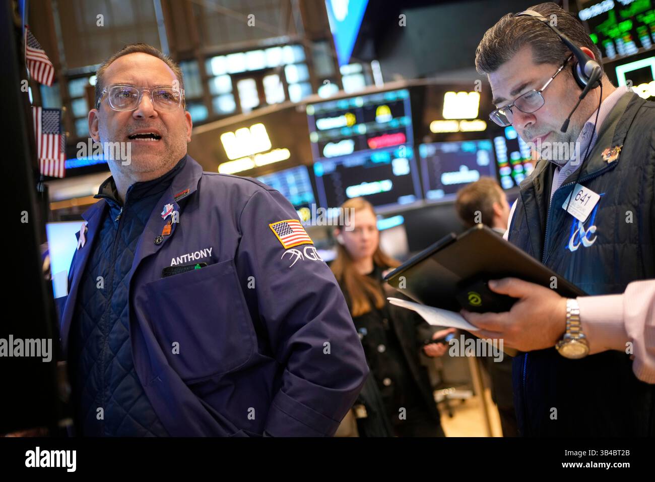 Anthony Matesic, left, and Michael Capolino work on the floor at the ...