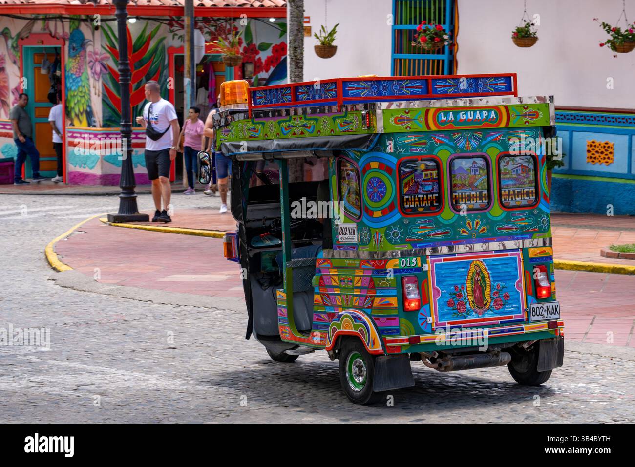 A colorful motochiva or mototaxi, tourist transportation in the town of ...
