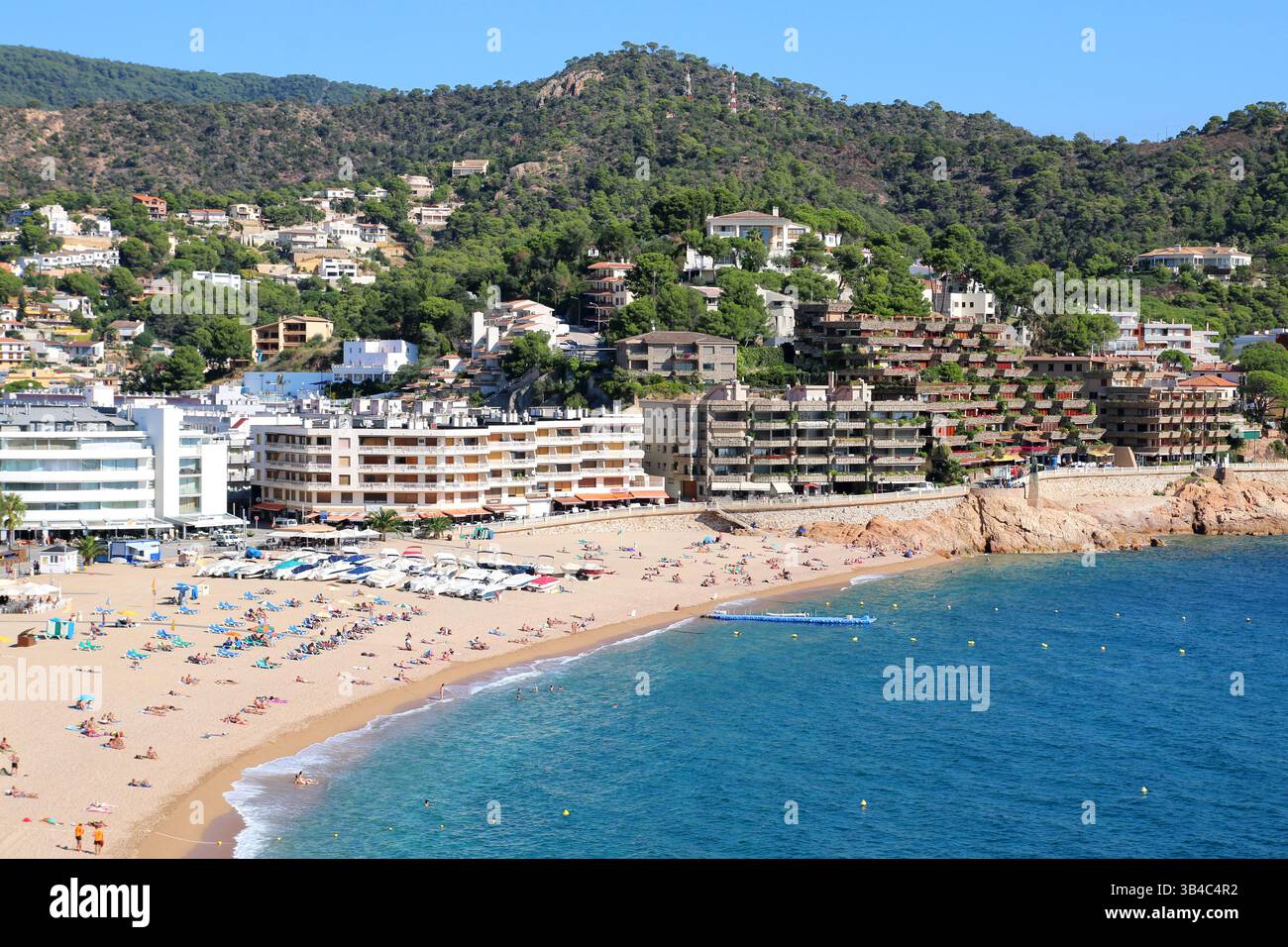 Aerial View of Seaside Hotels and Summer Tourists. A vibrant summer ...