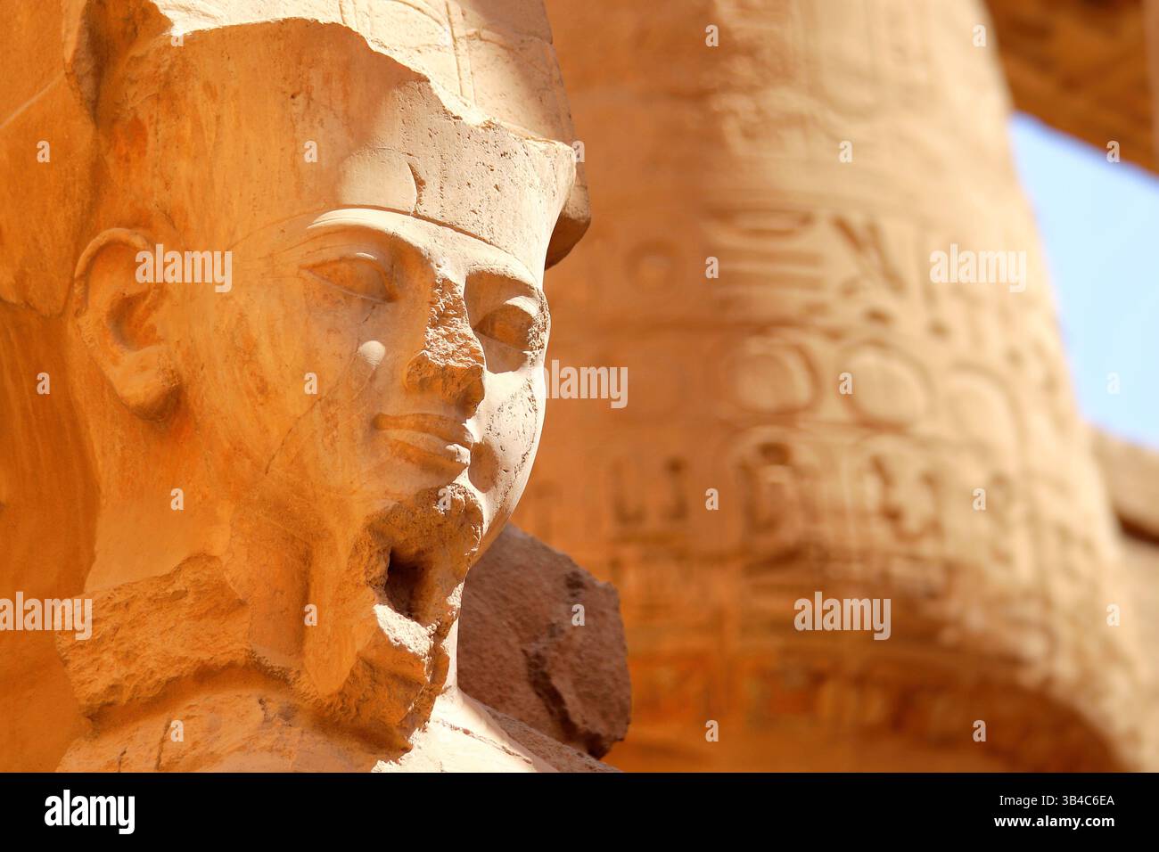 Detailed view of an ancient statue of Pharaoh with ceremonial beard and ...