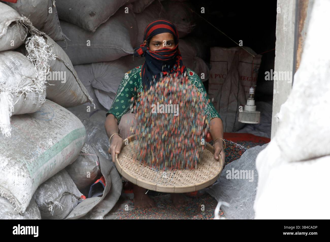 Dhaka, Bangladesh - April 30, 2025: Bangladeshi workers are working in ...