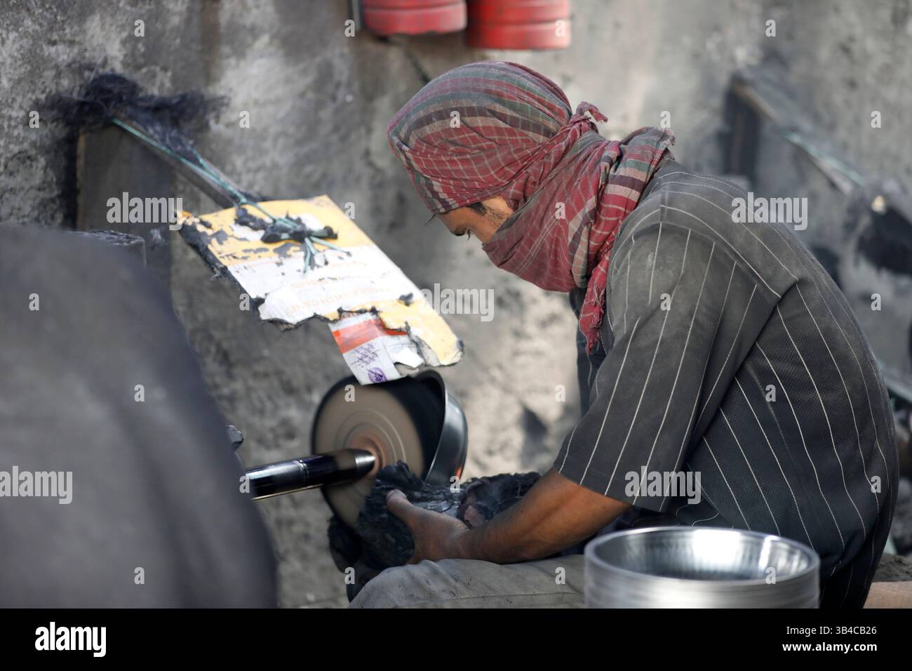 Dhaka, Bangladesh - April 30, 2025: Bangladeshi workers are working in ...