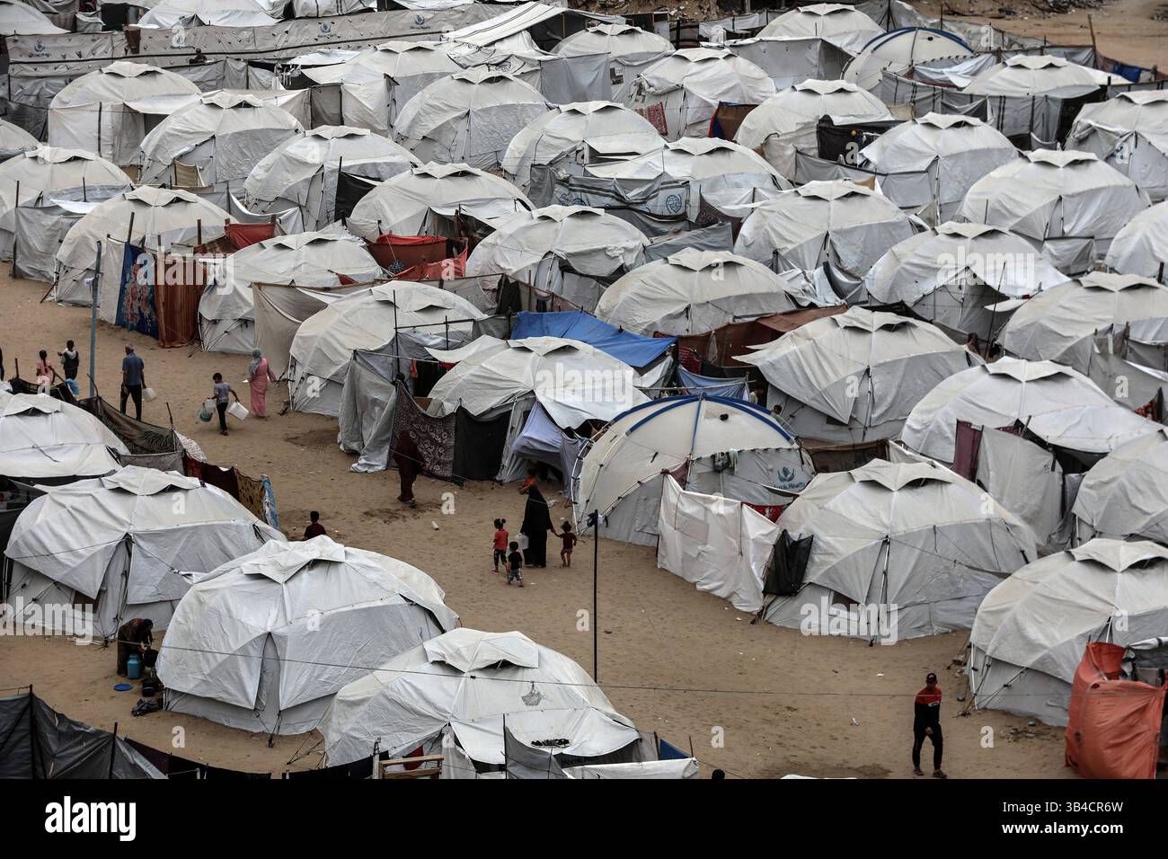 Palestinians, living in Jabalia refugee camp, try to maintain their ...