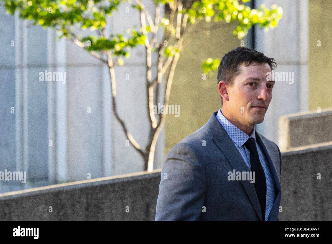 Former Grand Rapids Police officer Christopher Schurr enters the Kent ...