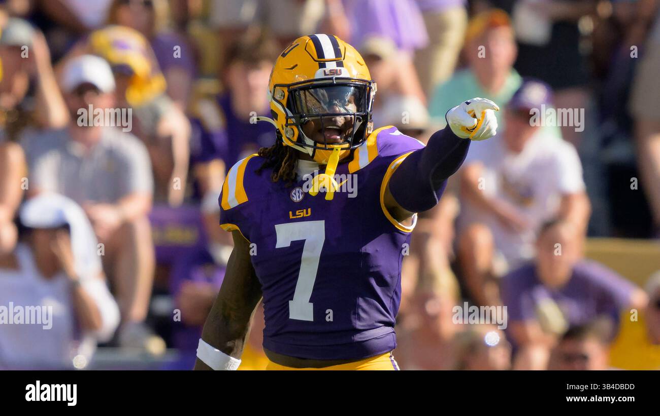 FILE - LSU linebacker Harold Perkins Jr. (7) signals during an NCAA ...