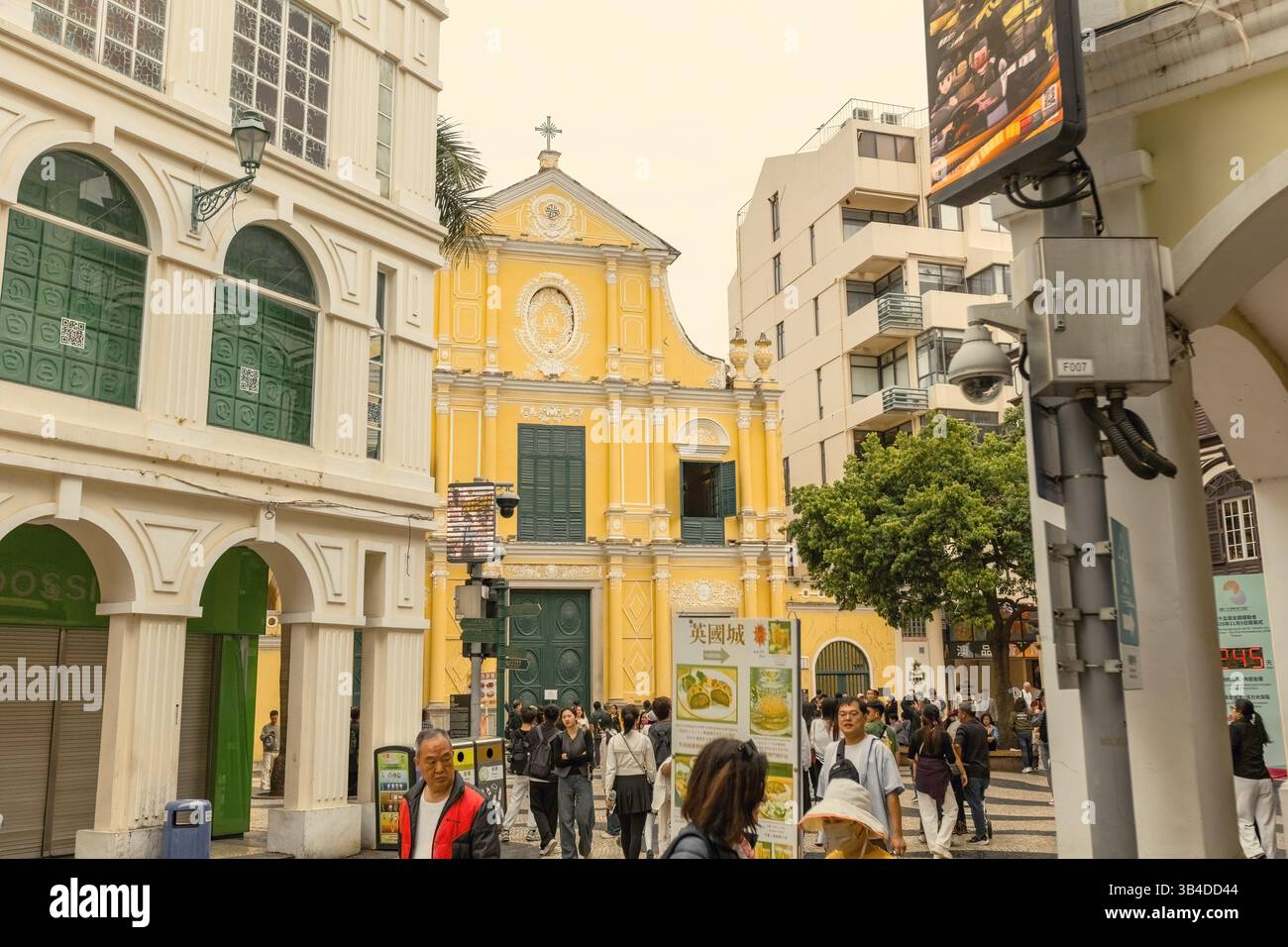 Exterior of St. Dominic's Church and crowd of people in front in Macau ...