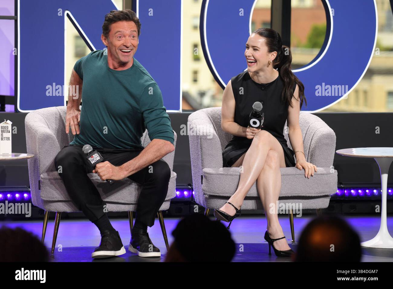 Hugh Jackman and Rachel Brosnahan on stage at Global Citizen NOW summit ...