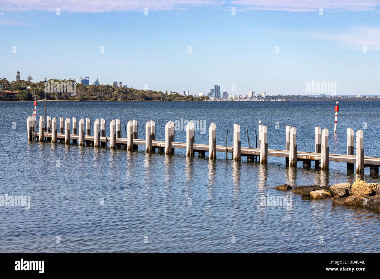 A wooden jetty at Point Walter Reserve (Dyoondalup) on the Swan River ...