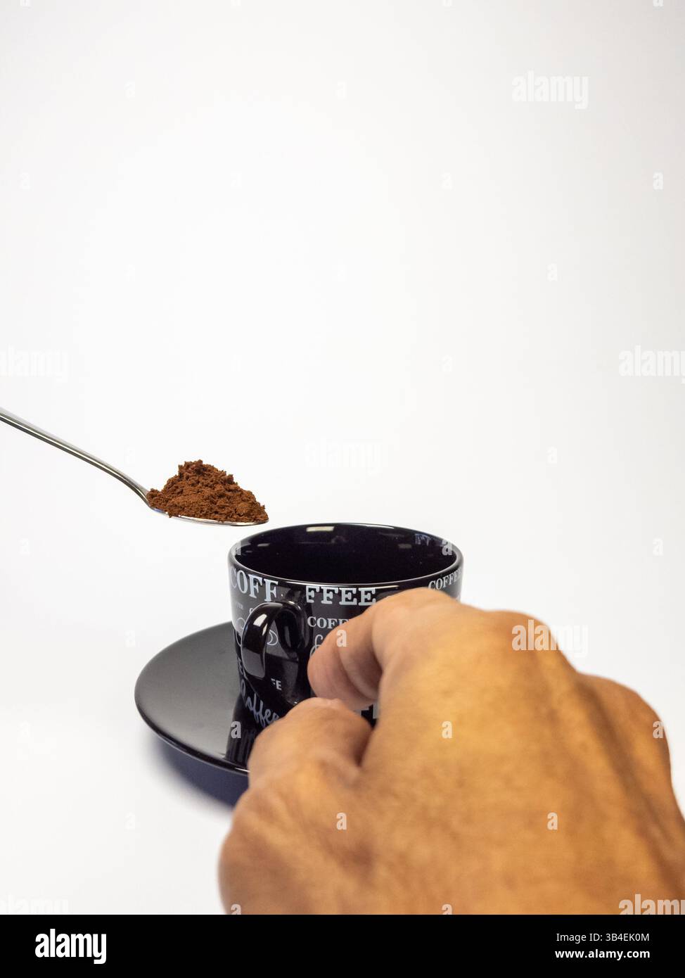 Preparing instant coffee spoonful hi-res stock photography and images ...