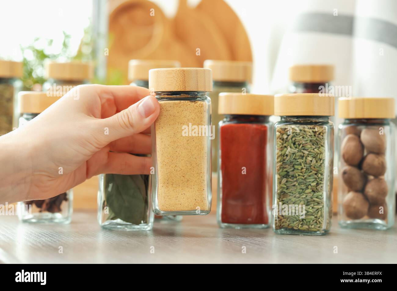 Woman hand taking seasoning hi-res stock photography and images - Alamy