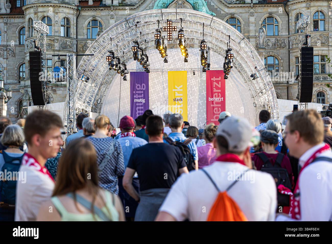Hanover, Germany. 30th Apr, 2025. Visitors watch the opening service of ...