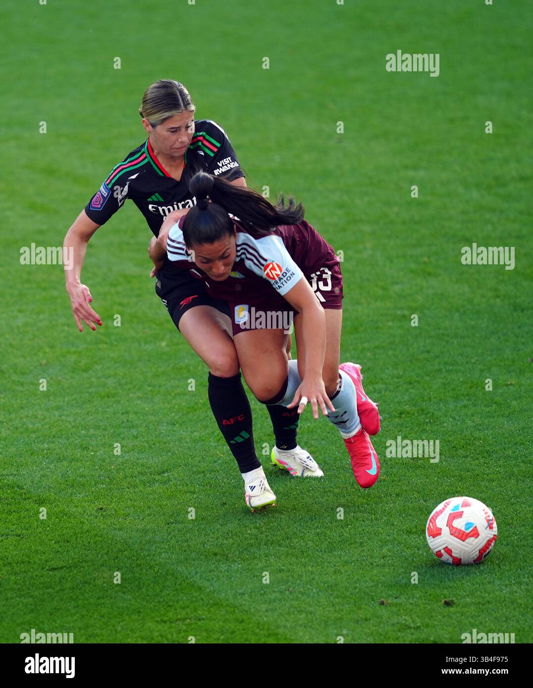 Aston Villa's Maz Pacheco and Arsenal's Kyra Cooney-Cross (left) during ...