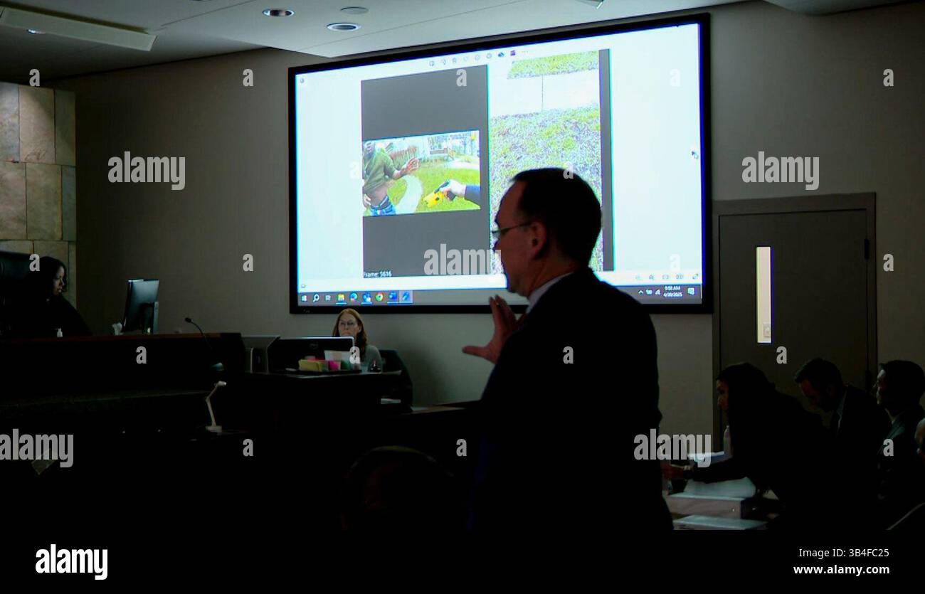 Prosecutor Chris Becker talks through camera footage with Nicholas ...