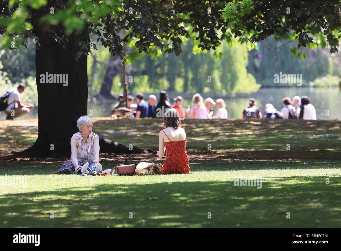 Unusually hot weather for April in St james Park, central London, UK ...