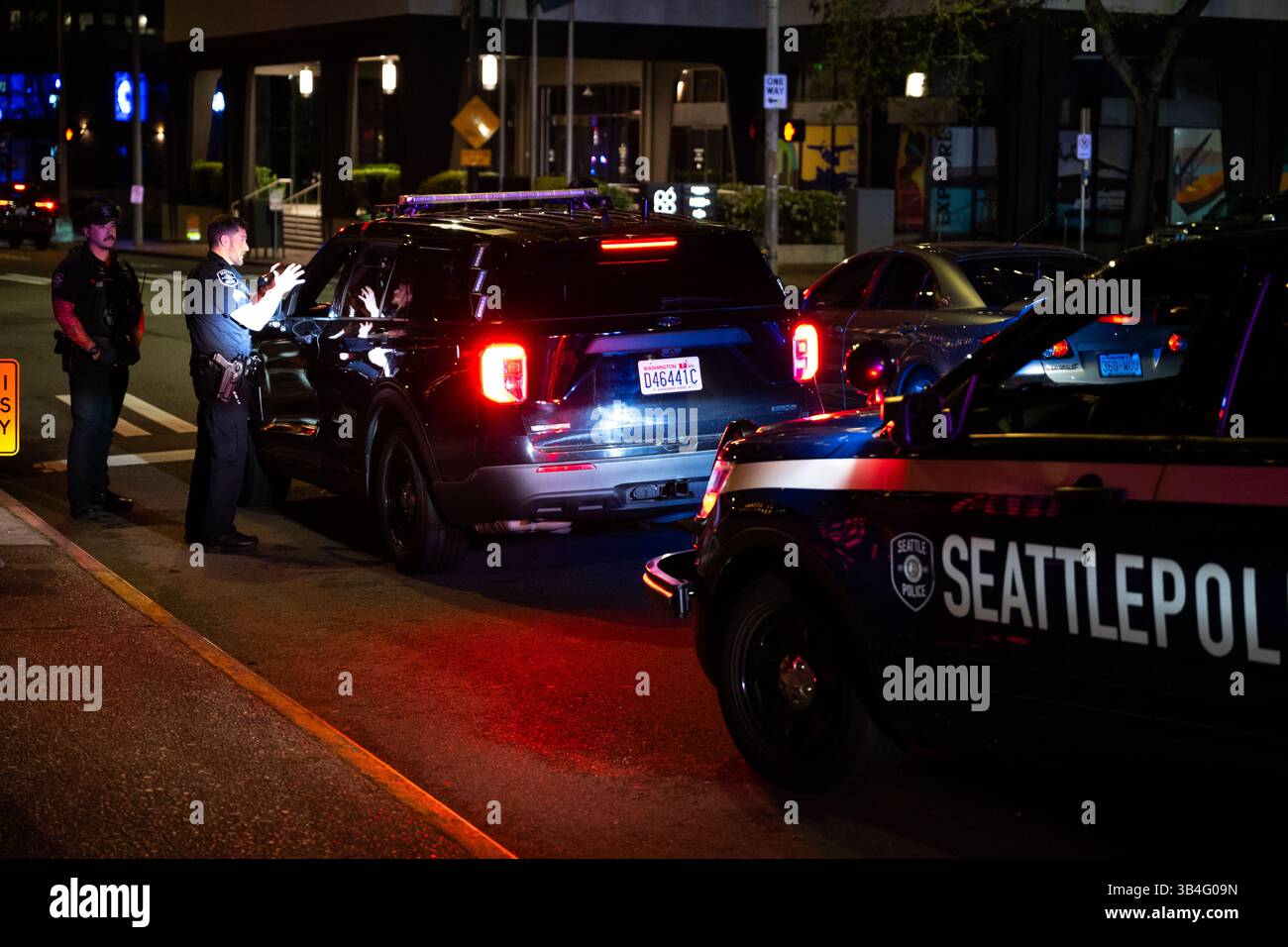 Seattle, USA. 20th Apr 2025. Early in the AM police stop an unmarked ...