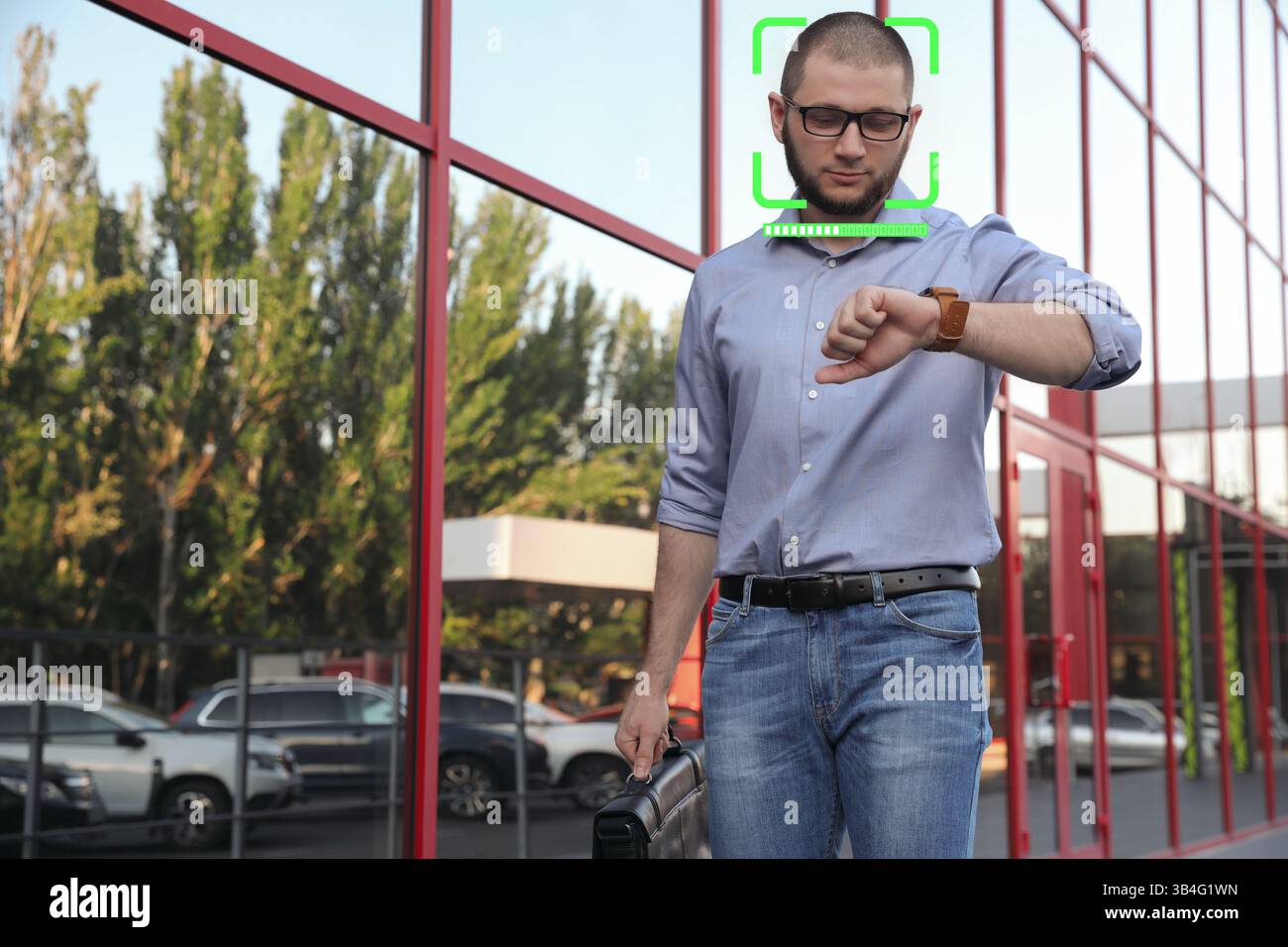 Facial recognition system identifying man checking time on city street ...