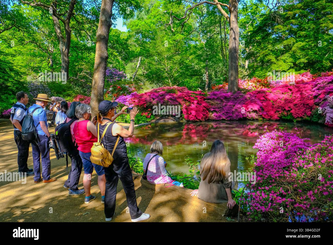 London, UK. 30th April, 2025. People gather around the Still Pond ...