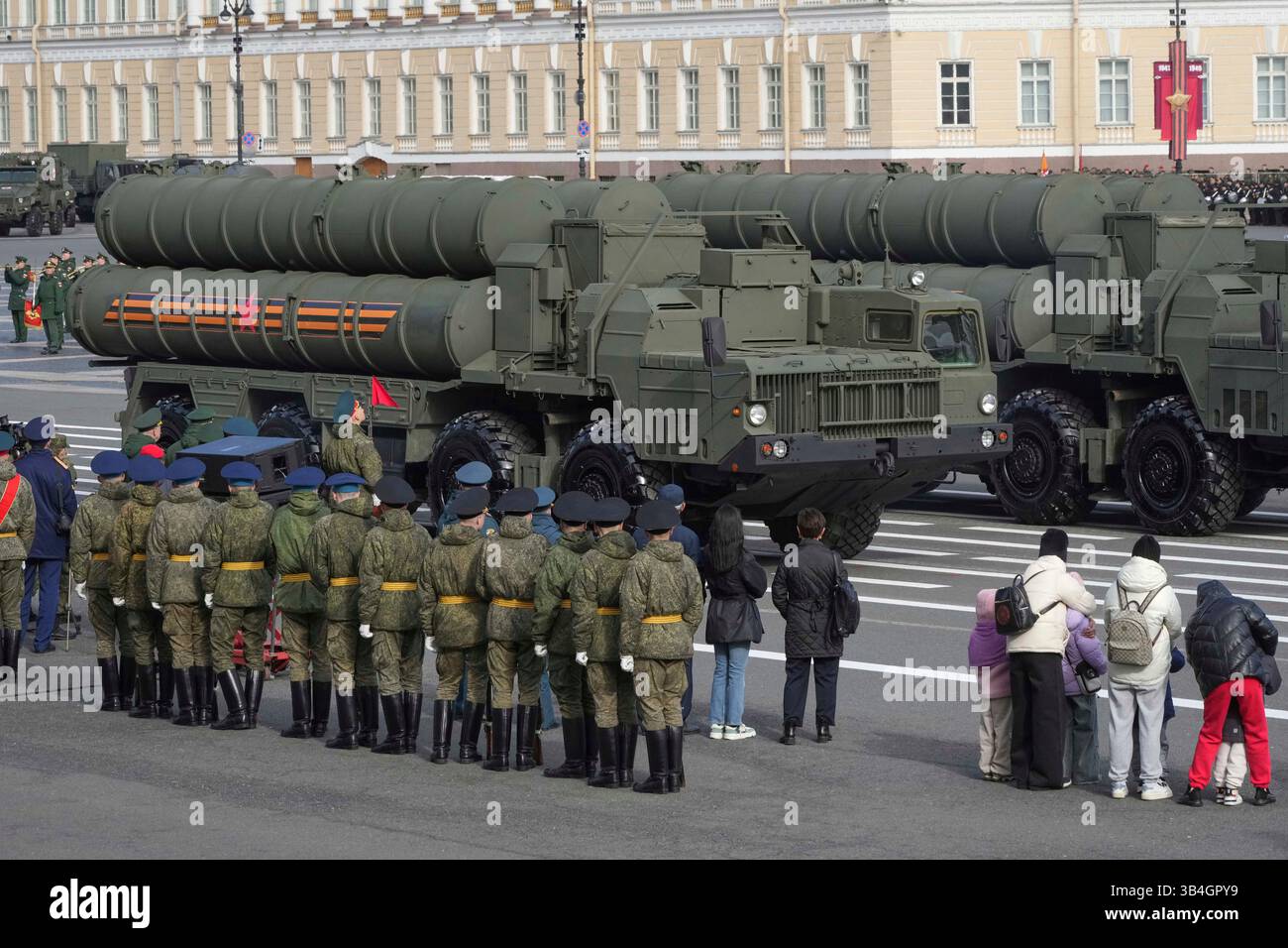 Russian S-400 anti-aircraft missile system launchers roll during a ...