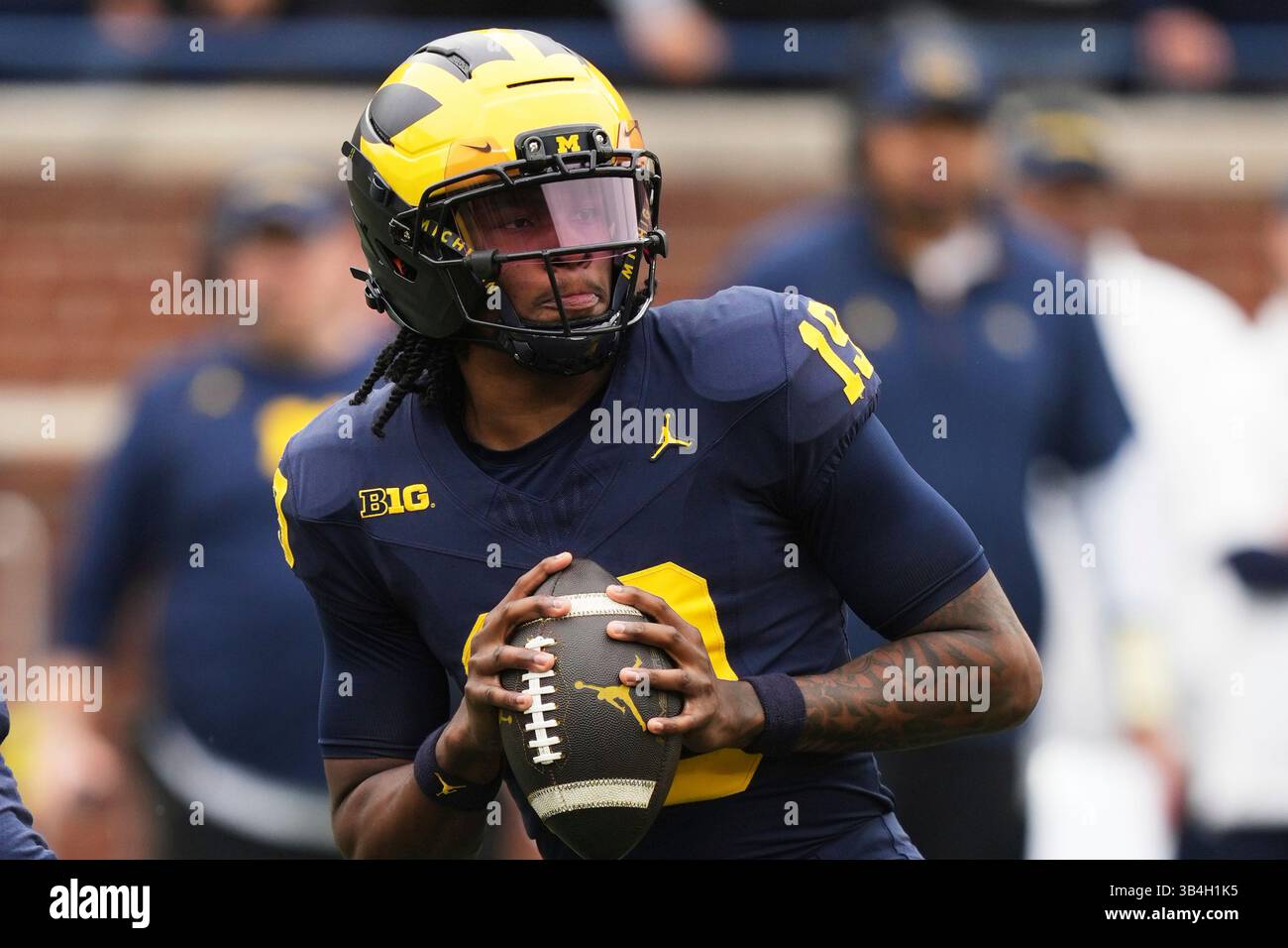Michigan quarterback Bryce Underwood throws during an NCAA college ...