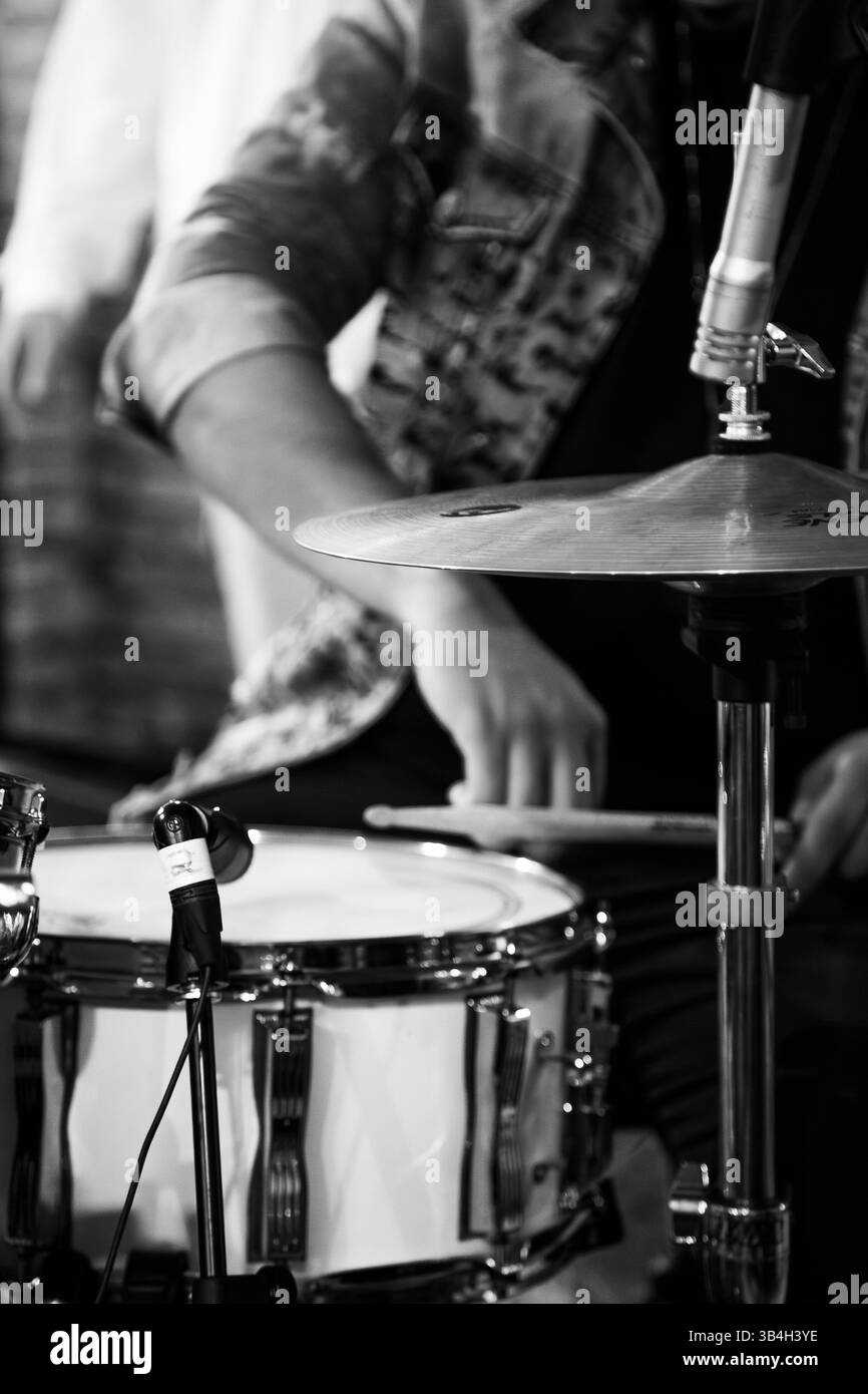 Black and White of Drummer Performing on Snare Drum with Microphone ...