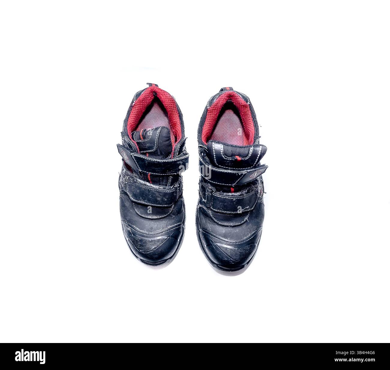 Used safety shoes for different industry Stock Photo - Alamy