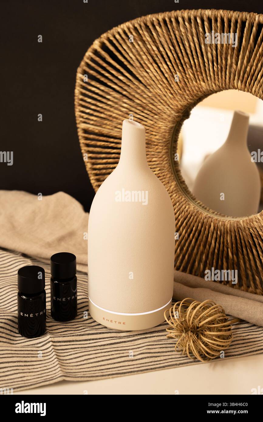 Decor Highlight – Black Cylinder and Woven Mirror Display Stock Photo ...