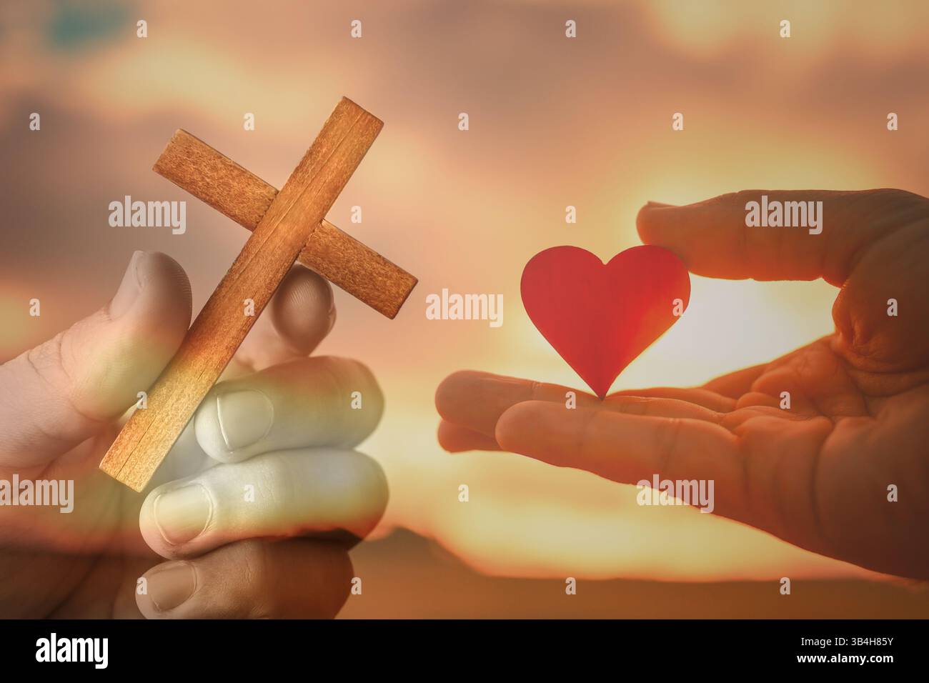 Hand holding cross. Religious symbol of forgives, salvation, love and ...