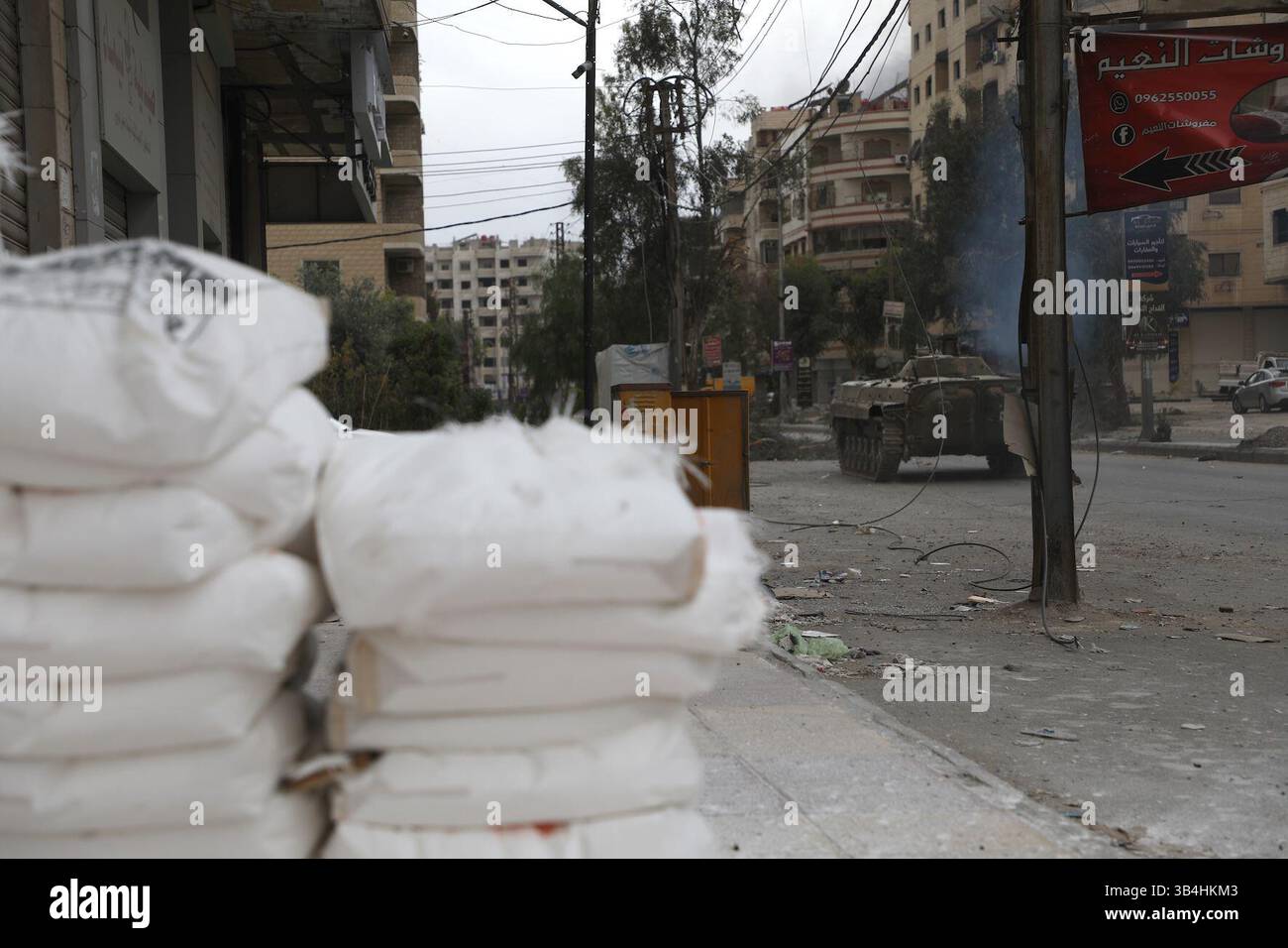 Ashrafiyat Sahnaya, Syria. 30th Apr, 2025. A Syrian military vehicle is ...
