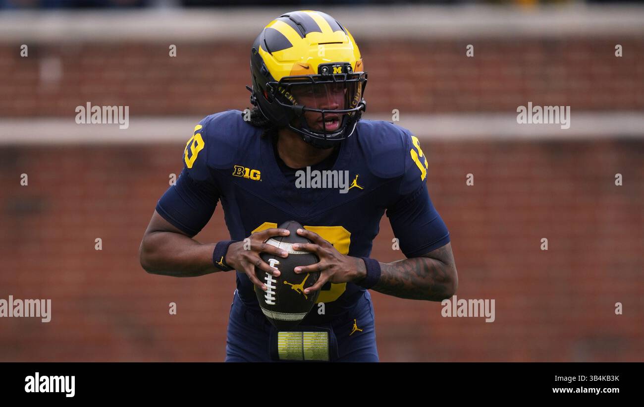 Michigan quarterback Bryce Underwood throws during an NCAA college football spring game in Ann ...
