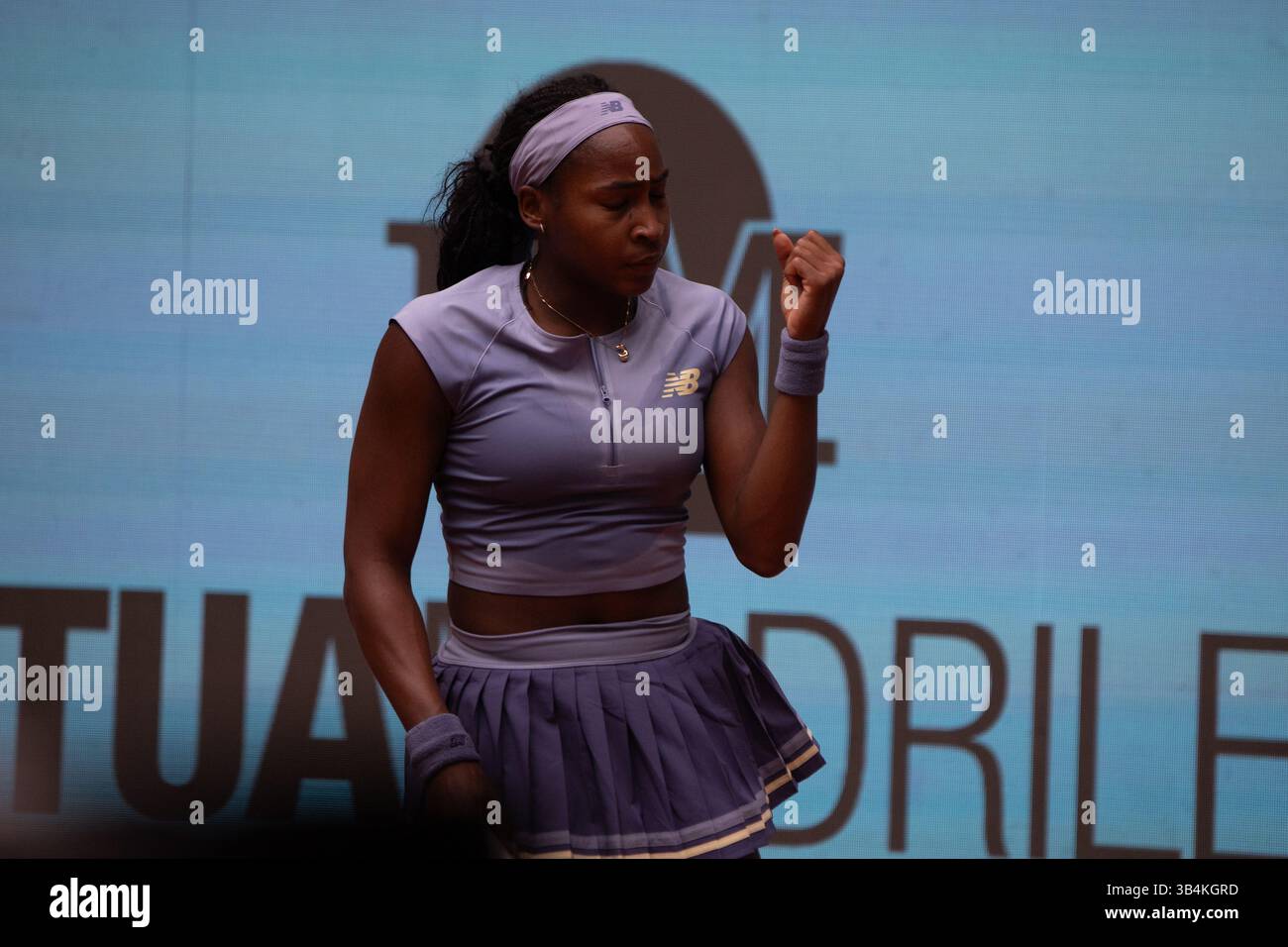 Madrid, Spain. 30th Apr, 2025. American Coco Gauff gestures against Russian Mirra Andreeva (not ...