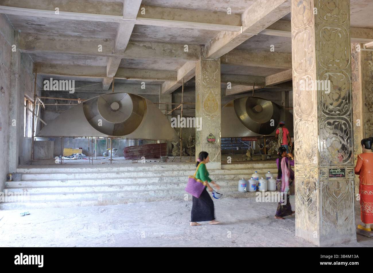 Constructing the eyes of the giant reclining buddha in Win Sein Taw Ya ...