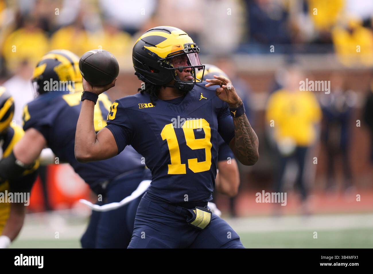 Michigan quarterback Bryce Underwood throws during an NCAA college ...