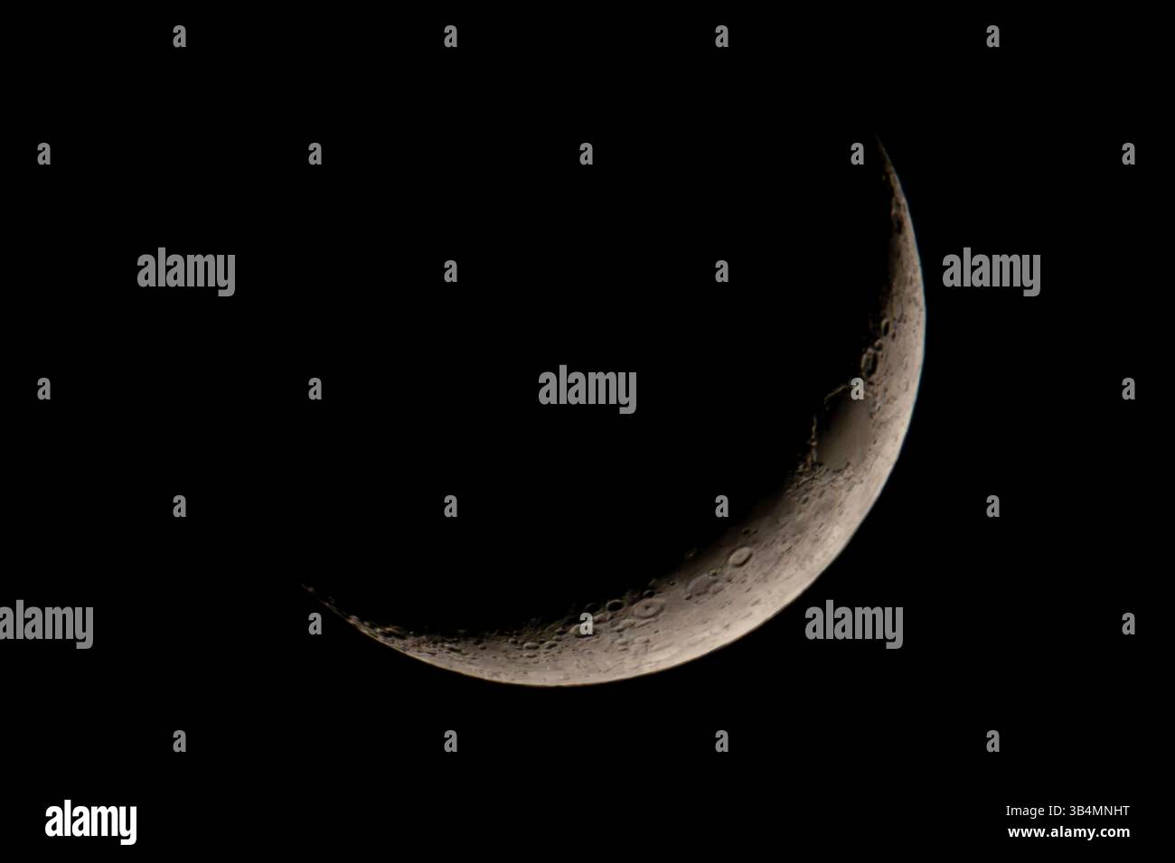 Lauder, UK. 30th Apr, 2025. The waxing cresent moon in the sky over ...