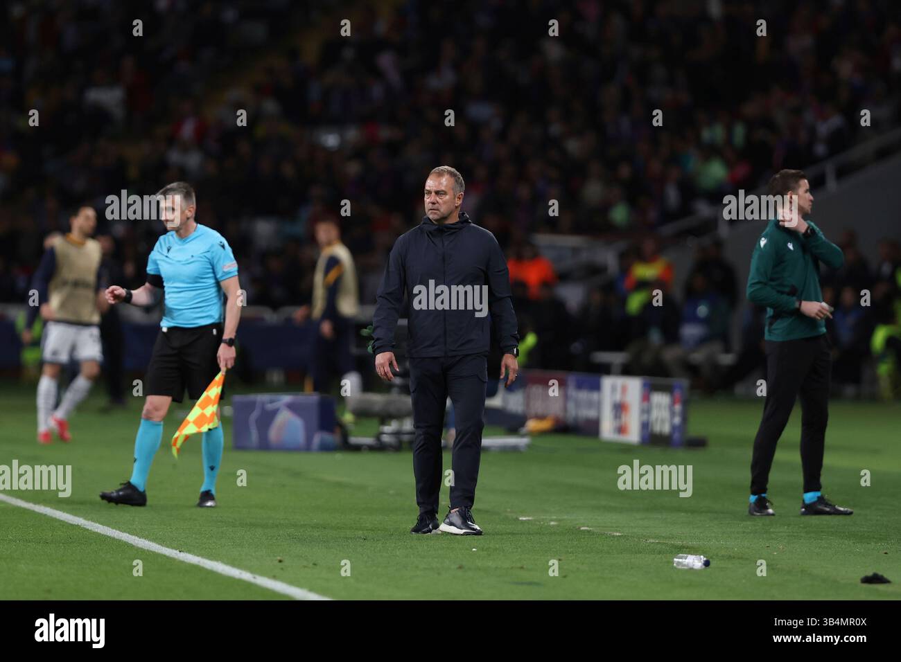 Hansi Flick, head coach of FC Barcelona, looks on during the UEFA Champions League 2024/25 Semi ...
