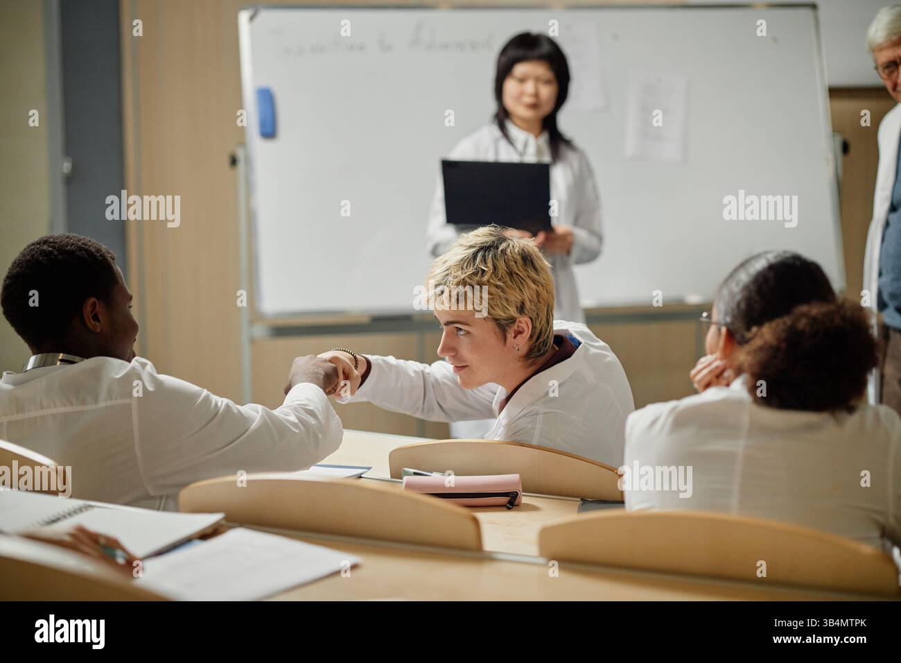 Medical Students Handshake Stock Photo - Alamy