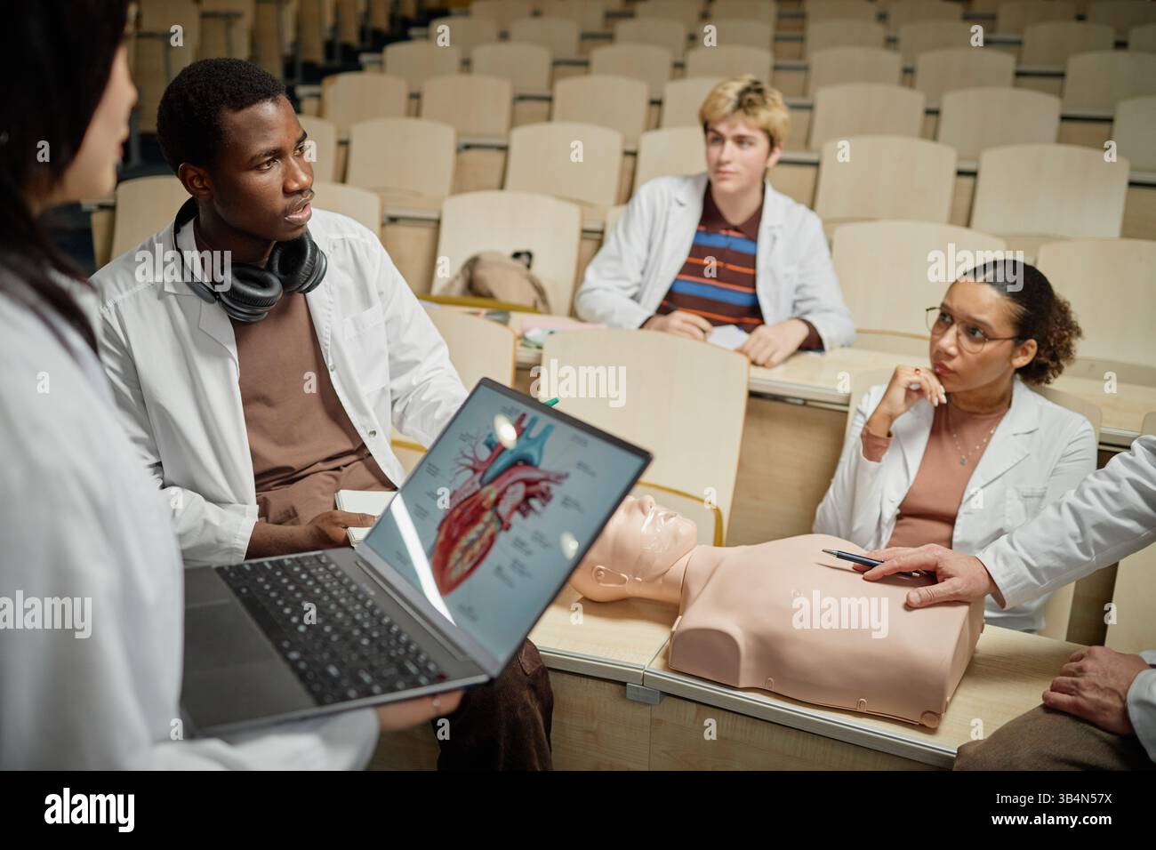 Black Student Listening to Professor During CPR Training Stock Photo ...