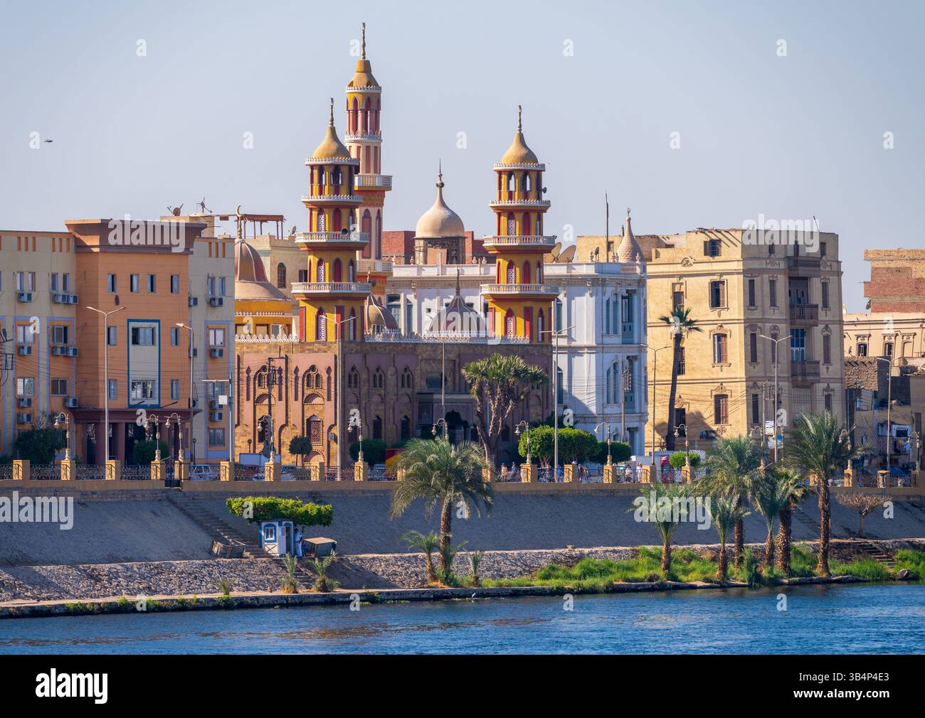 Large and ornate Mosque on waterfront in Esna Stock Photo - Alamy