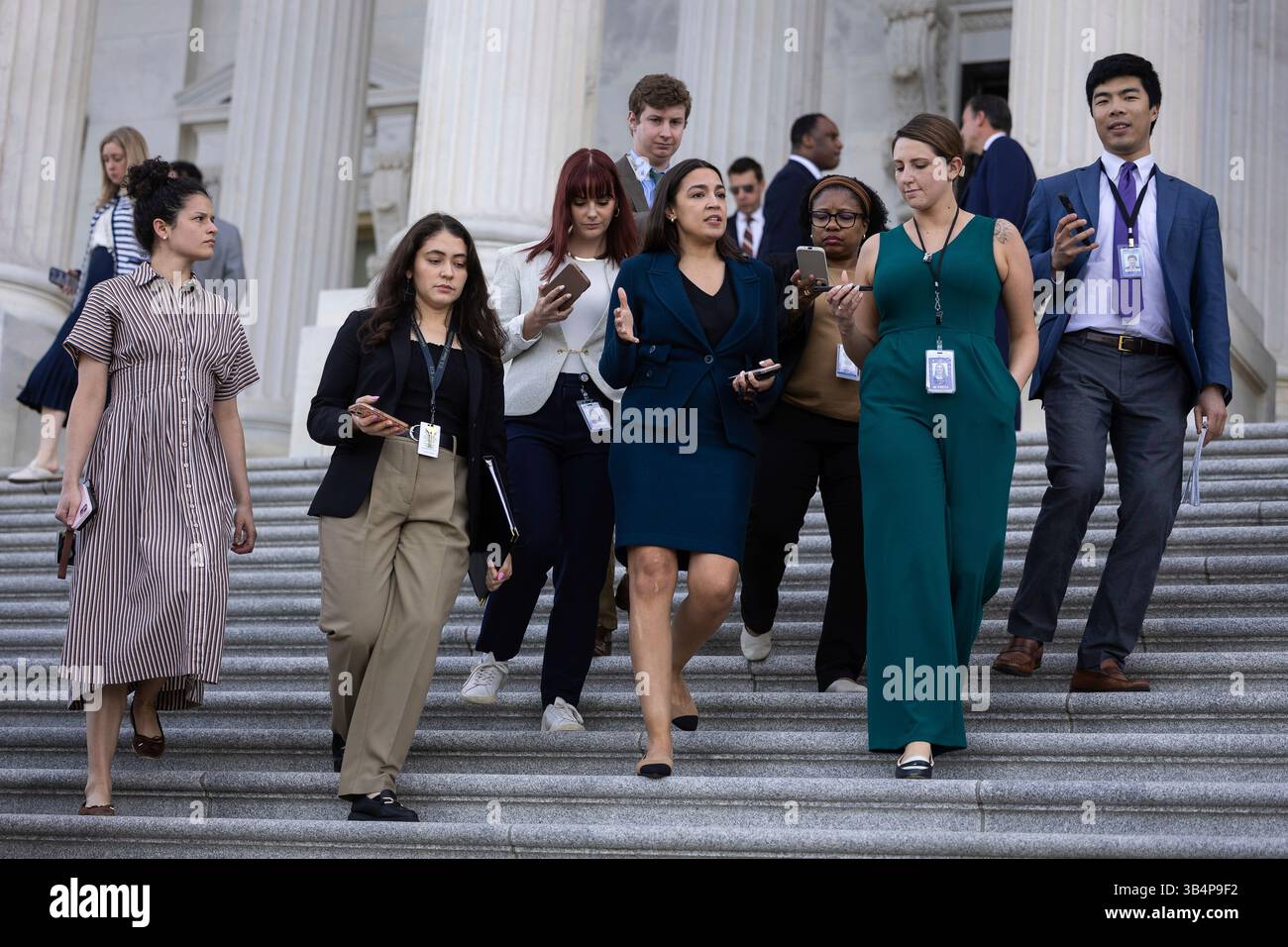 Rep. Alexandria Ocasio-Cortez (D-N.Y.) speaks with reporters as she ...