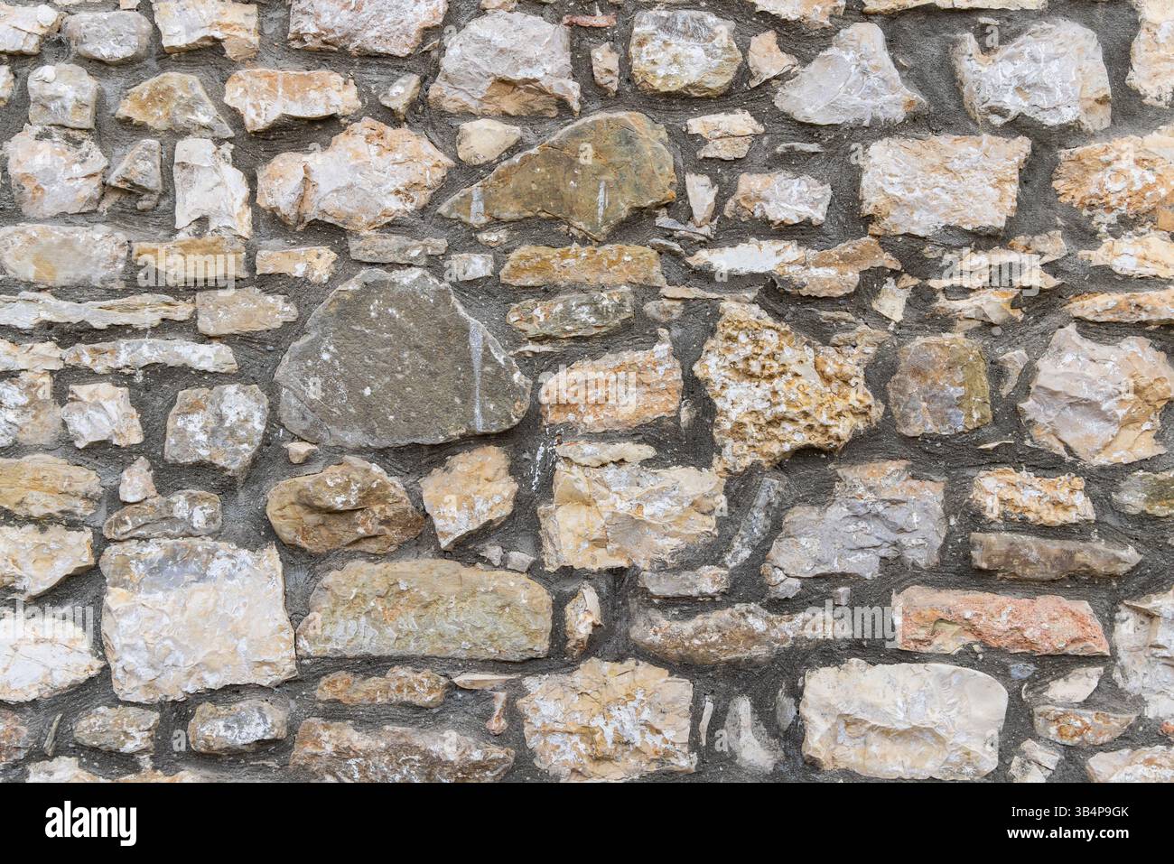 Berat, Albania. Patterns on a rough cut stone wall Stock Photo - Alamy