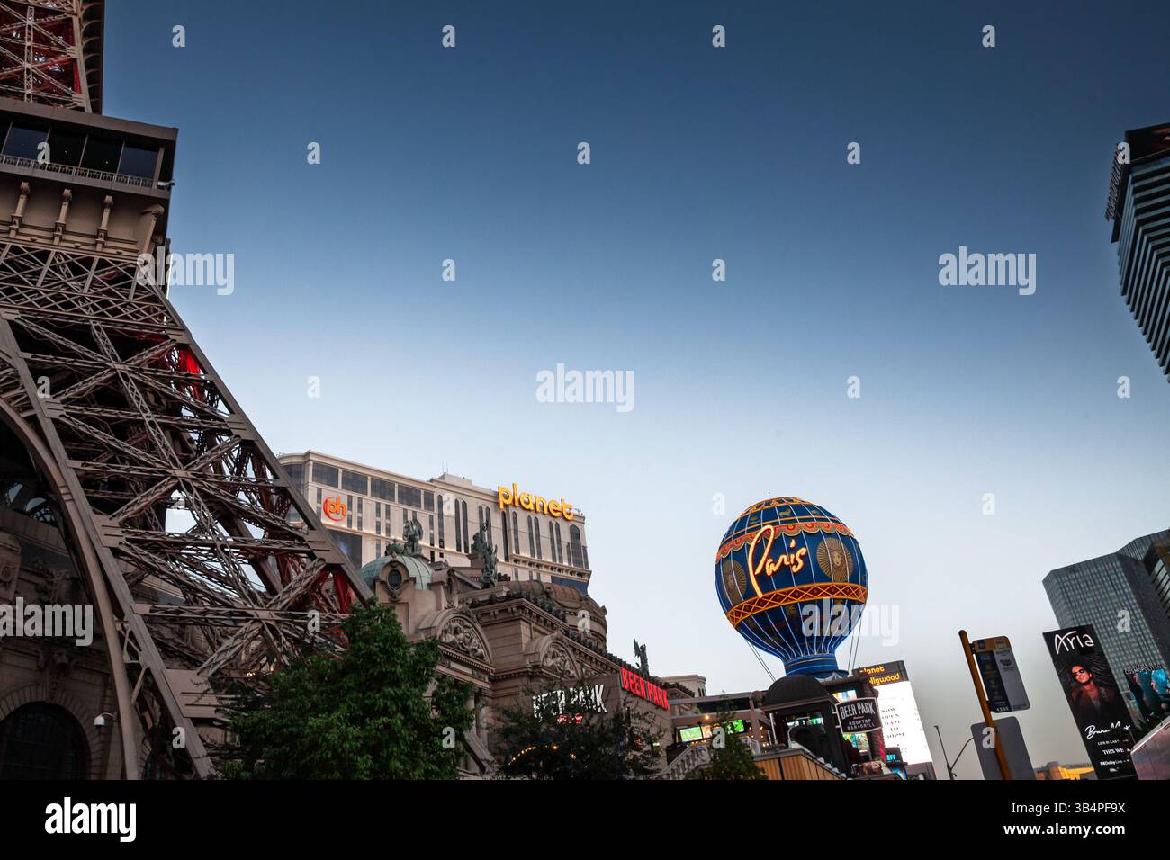 LAS VEGAS, AUGUST 21, 2024: Paris Las vegas resort blue and gold Montgolfier balloon and an iron ...