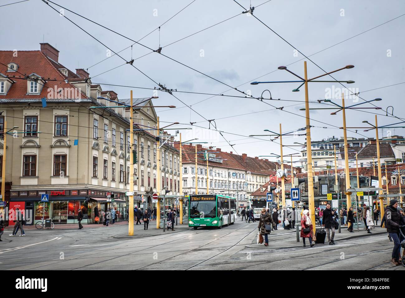 GRAZ, AUSTRIA - DECEMBER 17, 2024: Jakominiplatz transport hub: a green ...