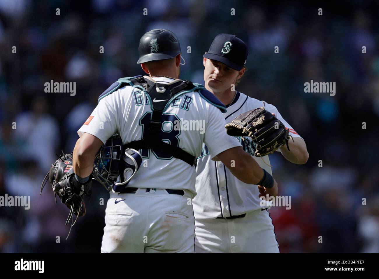 Seattle Mariners catcher Mitch Garver celebrates with pitcher Troy ...