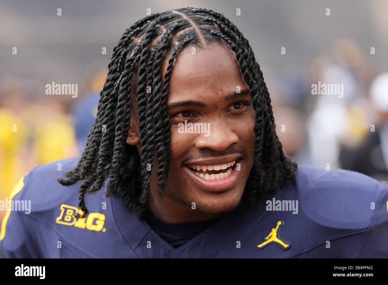 Michigan quarterback Bryce Underwood smiles after an NCAA college ...