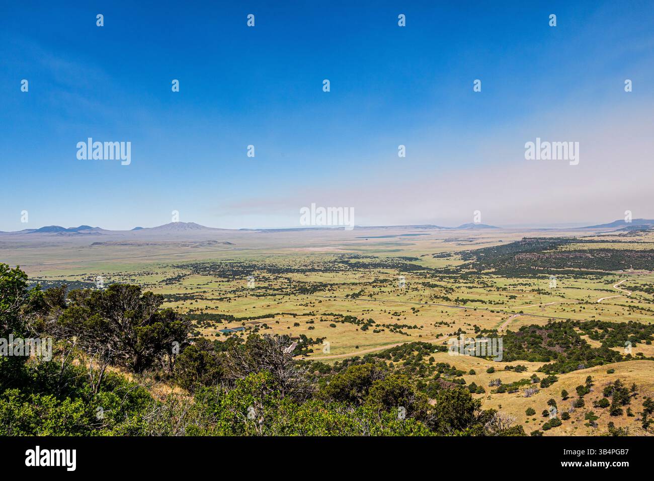 Serene landscape of the volcanic field seen from Crater Rim Trail at ...